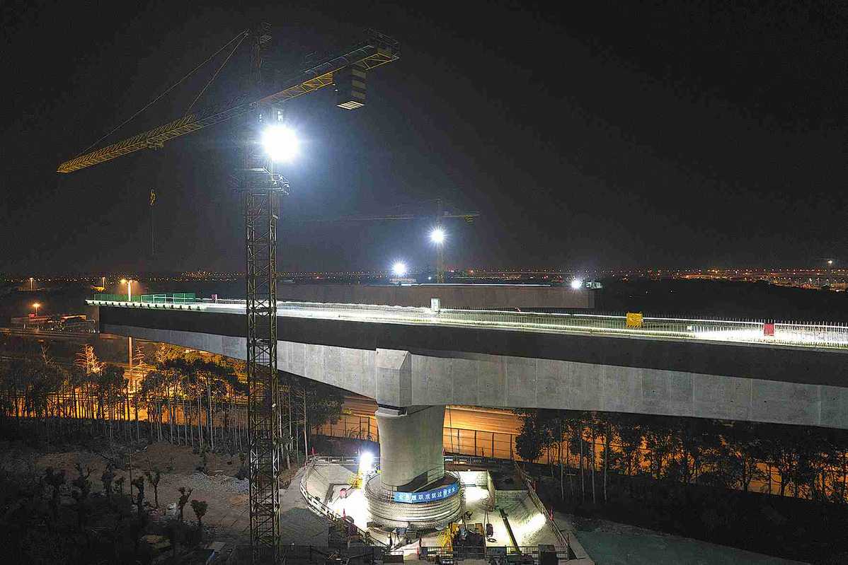 Bridge rotated over operational maglev line