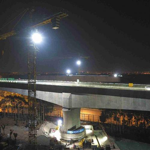 Bridge rotated over operational maglev line